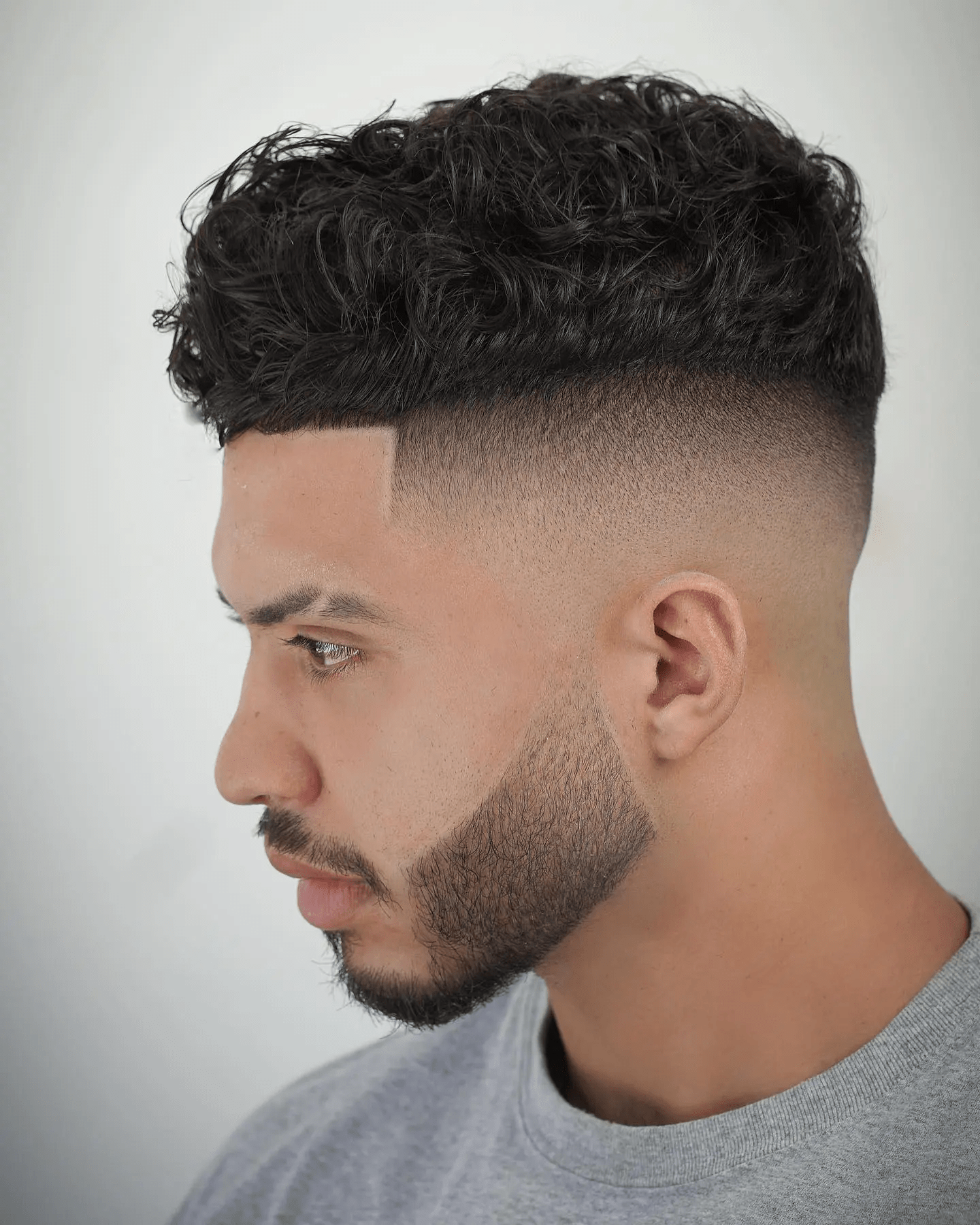 Best 16 Low Taper Fade with Textured Fringe Hairstyle - Taper Haircuts